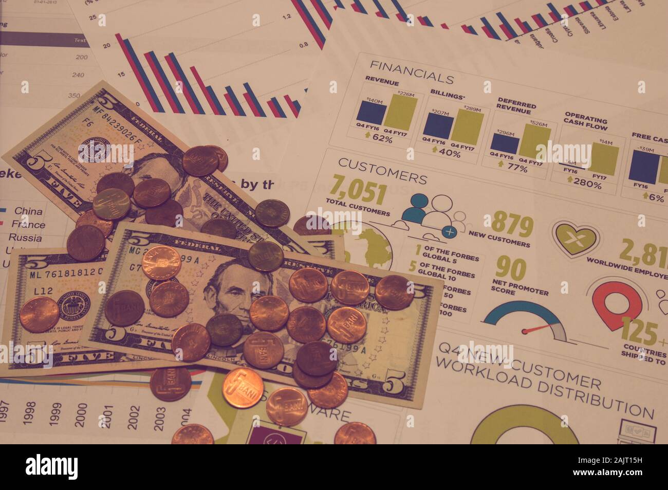 Money and financial record on a business man desk Stock Photo - Alamy