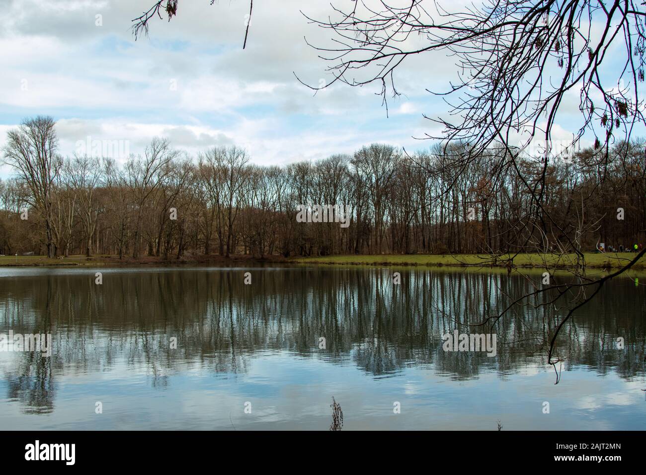 parkview with lake in foreground, reflection in water Stock Photo - Alamy