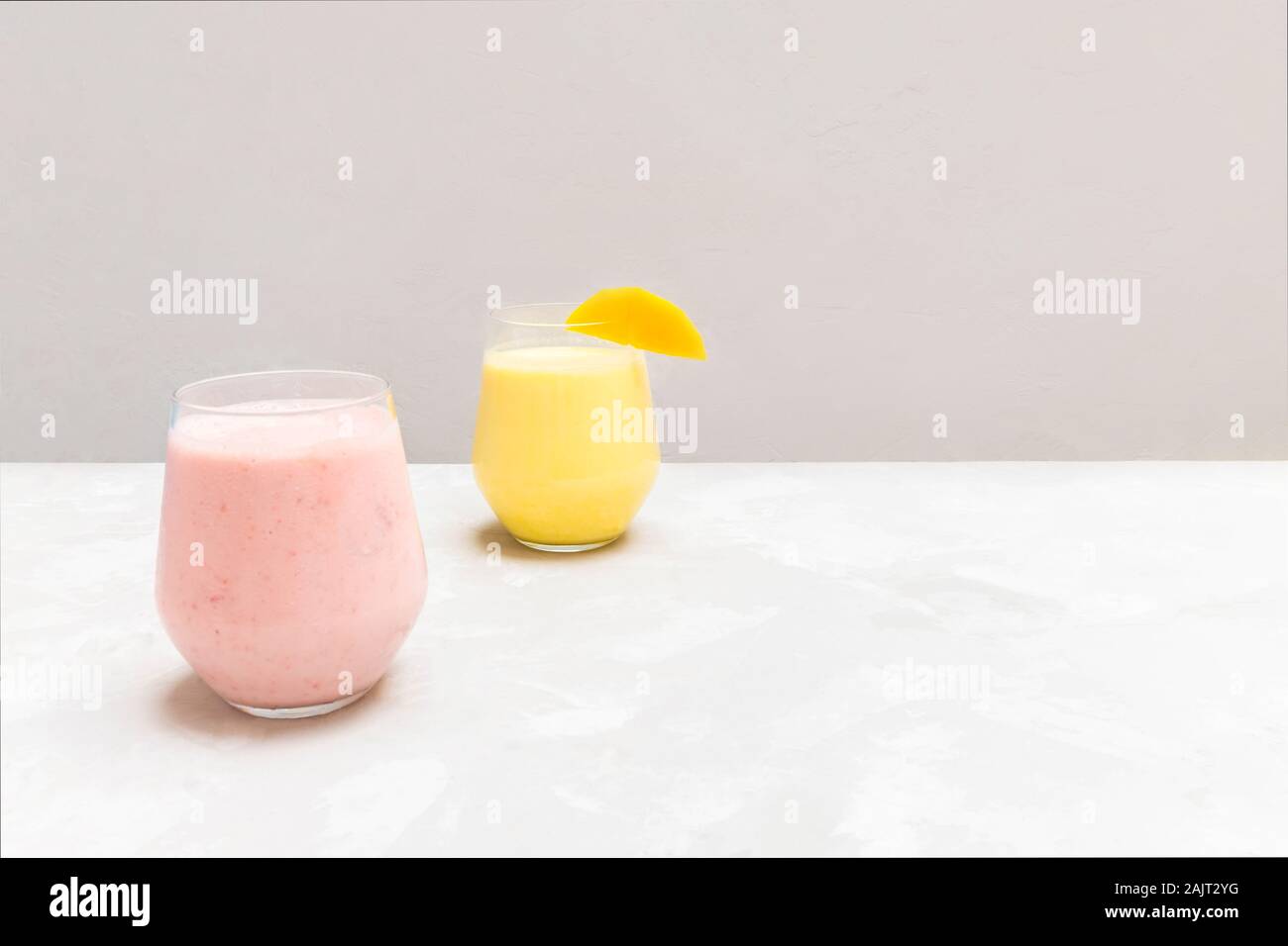 Traditional indian spiced drinks Mango lassi and Strawberry Lassi in ...