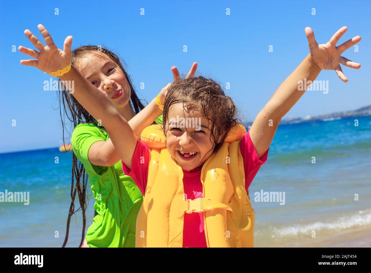 Two girls swimming hi-res stock photography and images - Alamy