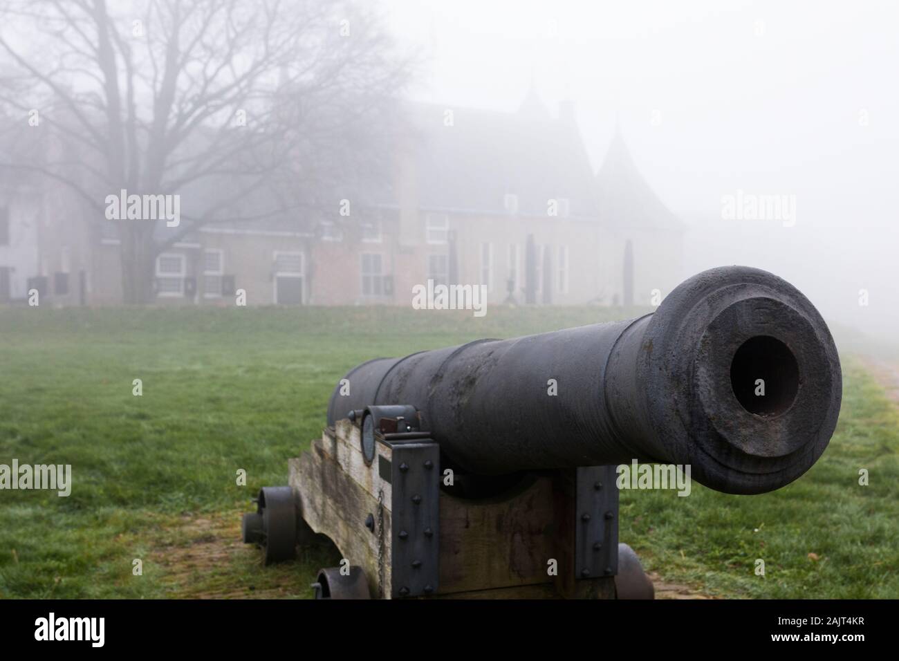 Historical cannon in front of the medieval castle of Coevorden ...