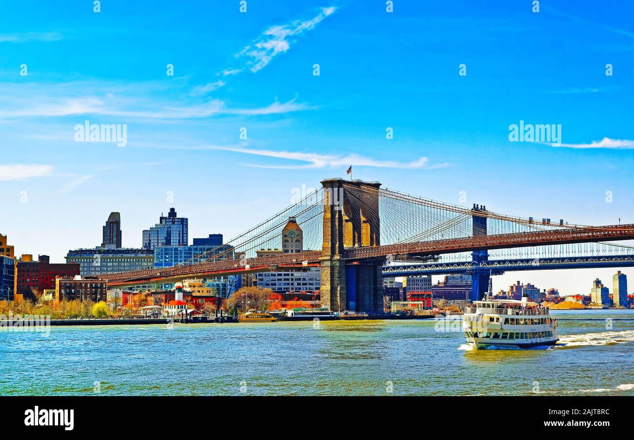 Ferry boat and Brooklyn bridge across East River reflex Stock Photo - Alamy