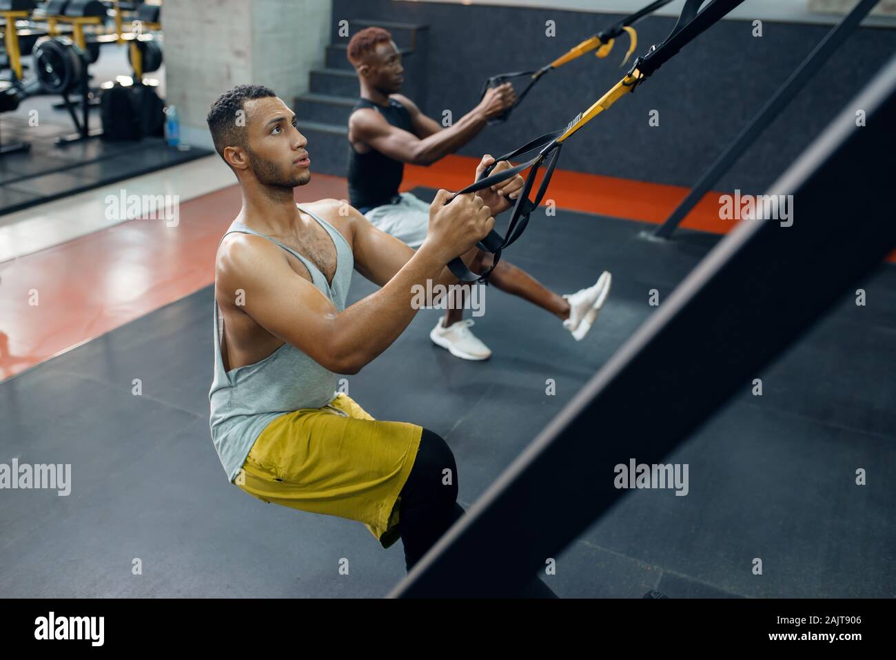 Two athletes exercise machine hi-res stock photography and images - Alamy