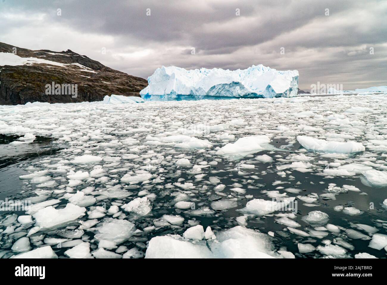 Melting glacier into sea hi-res stock photography and images - Alamy