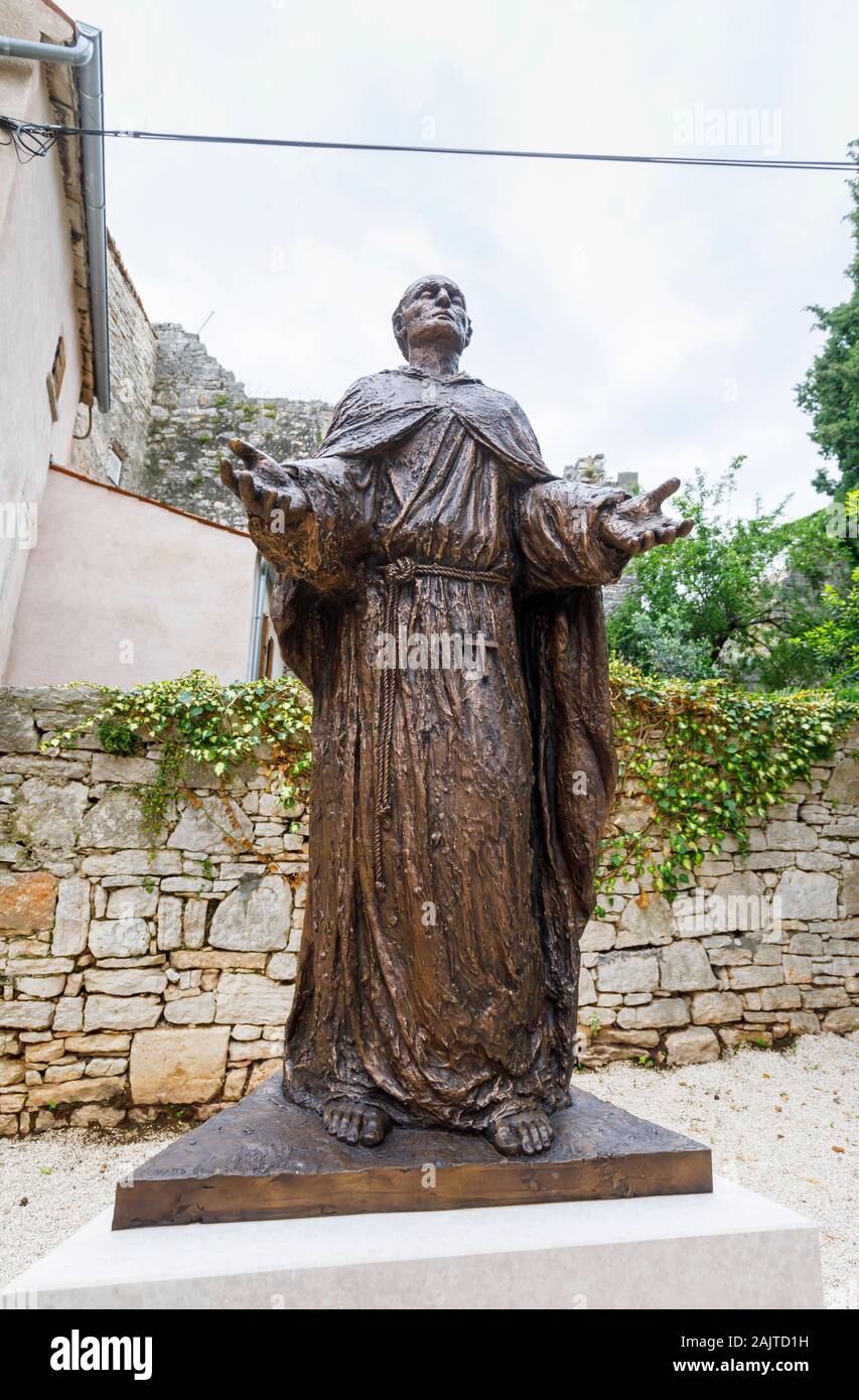 Statue of a saint outside the Parish church of Visitation of Blessed ...