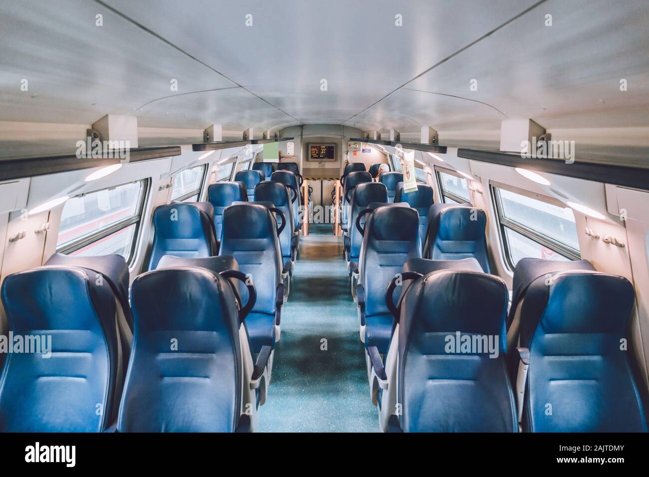 Interior of railway passenger car of the second class in train in ...