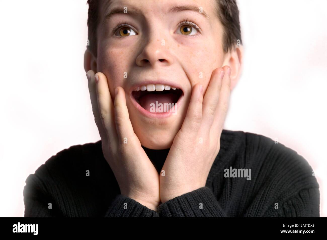Young Caucasian boy with a surprise look on his face Stock Photo - Alamy