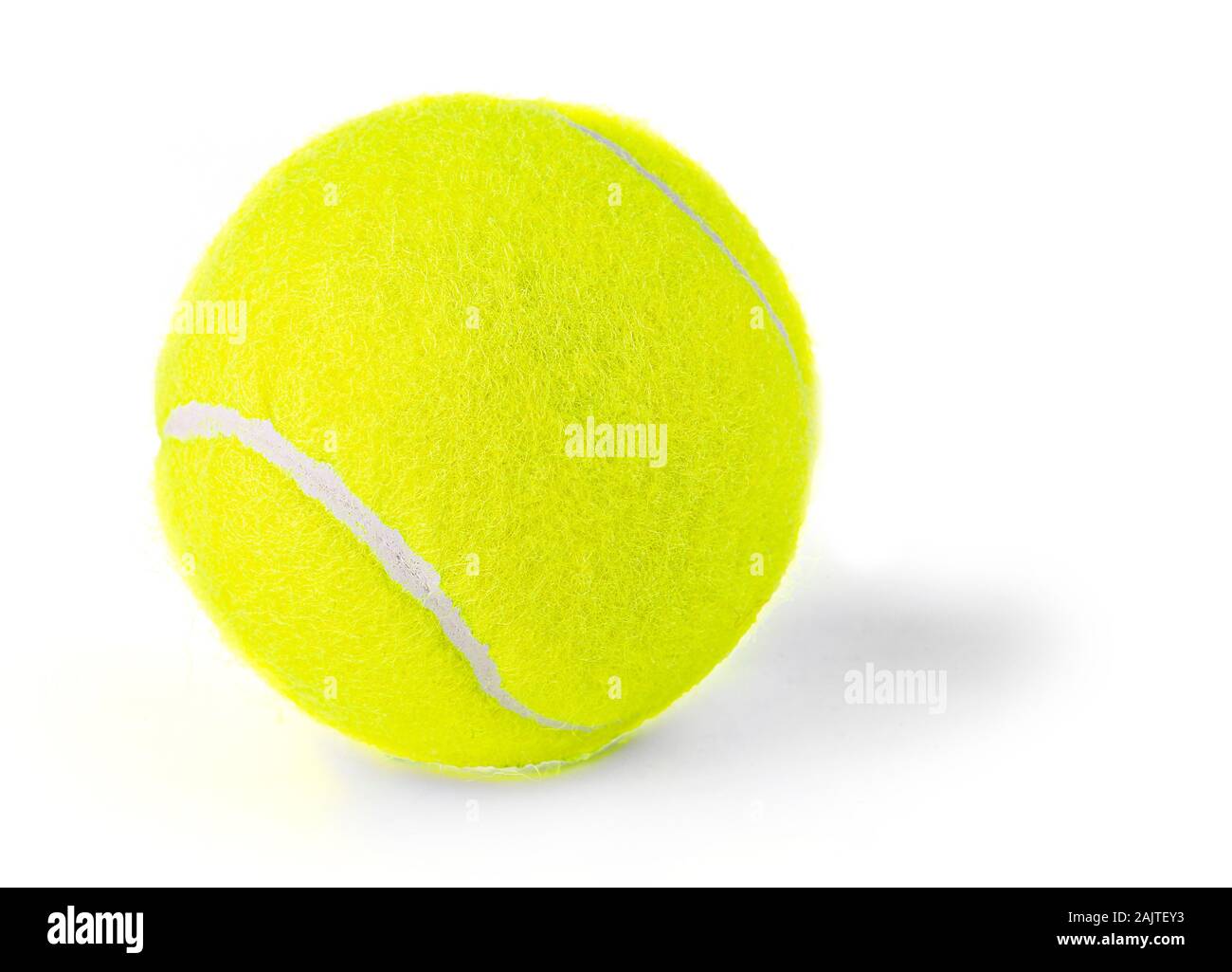 The Single tennis ball isolated on white background Stock Photo - Alamy