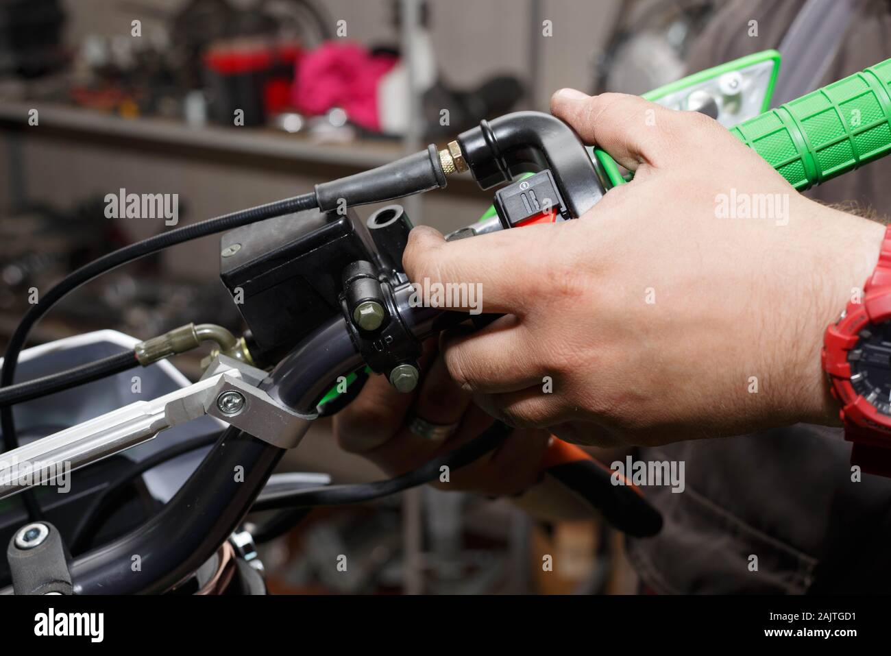 The master installs the plastic brake protection of the hand brake, as ...