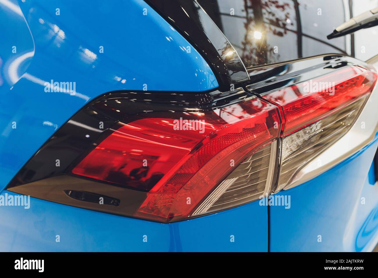 Rear light of a modern car close-up, white body blue body Stock Photo ...