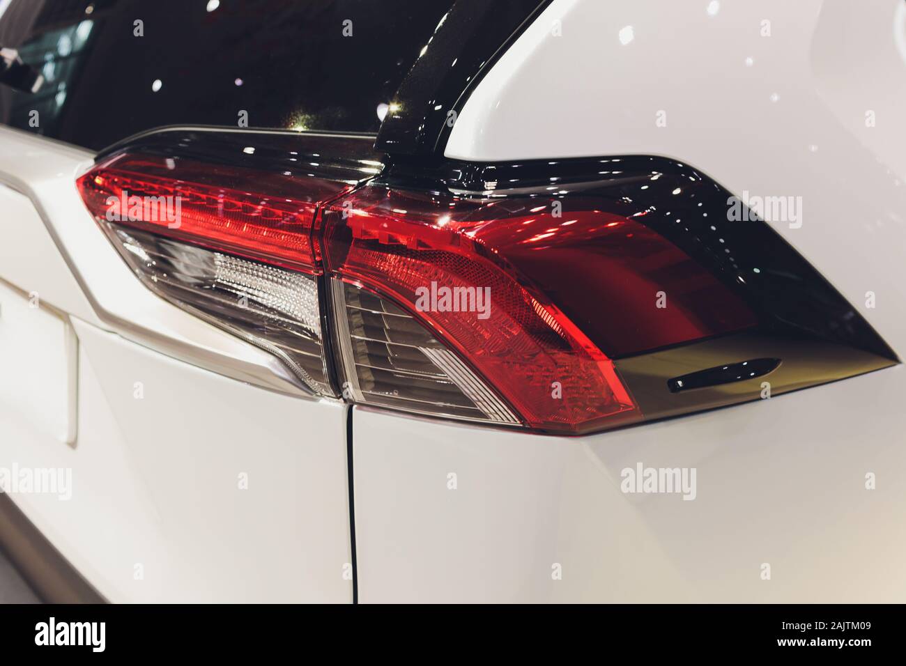 Rear light of a modern car close-up, white body Stock Photo - Alamy