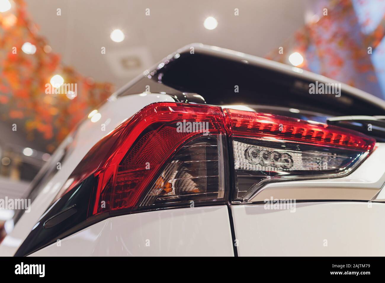 Rear light of a modern car close-up, white body Stock Photo - Alamy