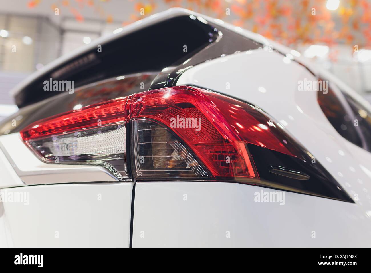 Rear light of a modern car close-up, white body Stock Photo - Alamy
