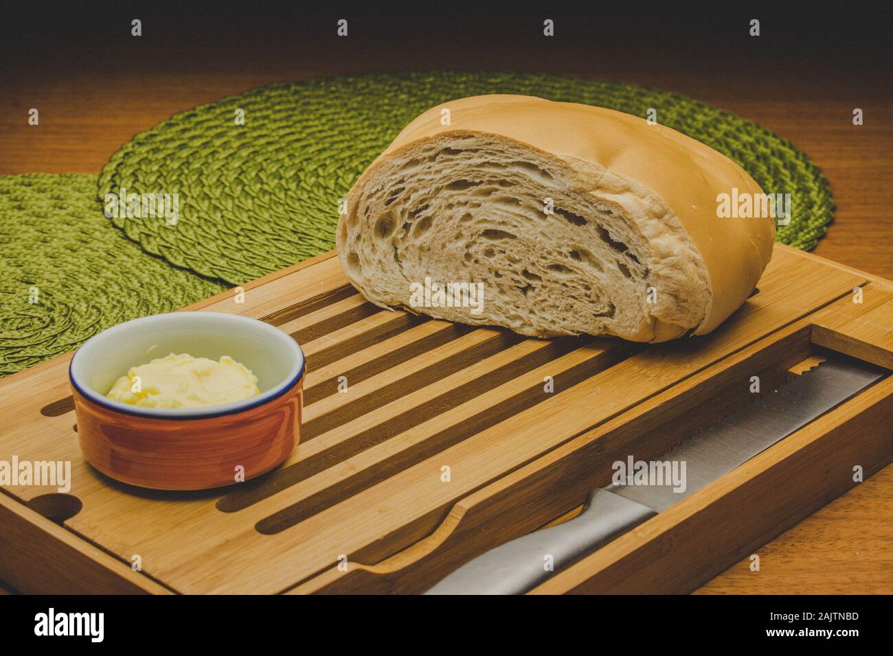 cut toast bread with a big knife Stock Photo - Alamy
