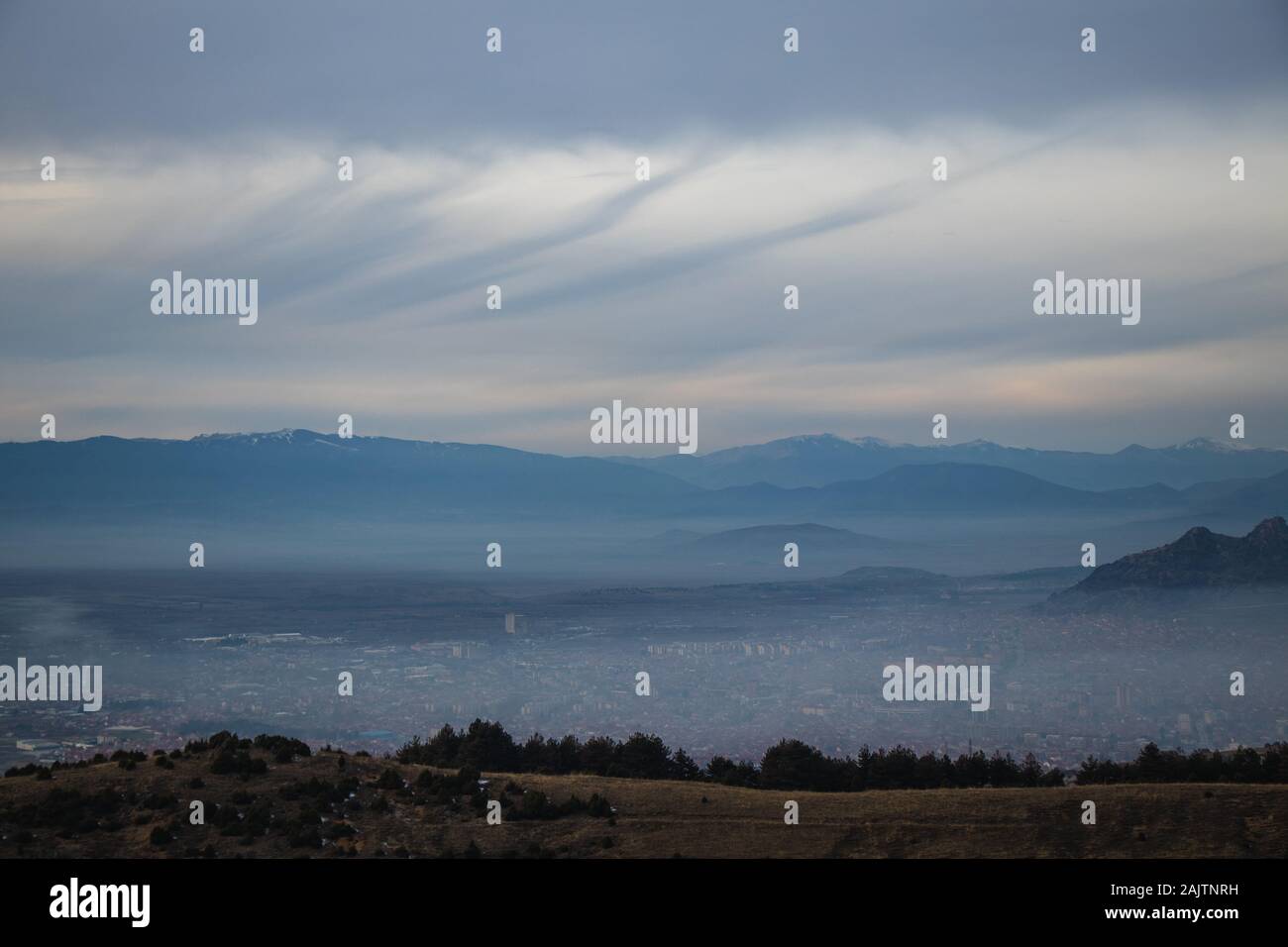 Fog and smoke caused by pollution in an urban city Stock Photo - Alamy