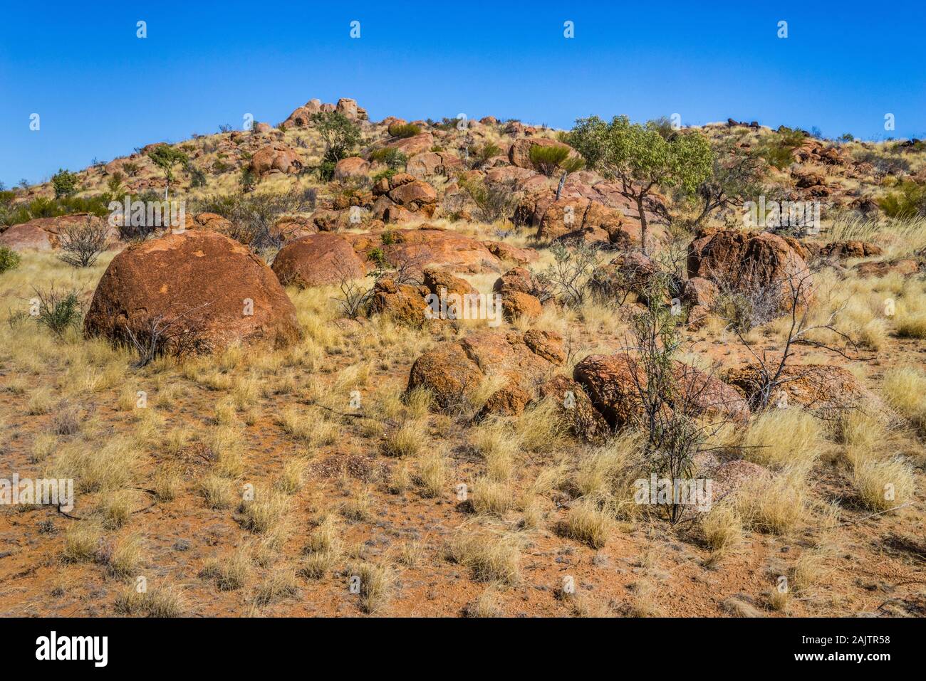 boulders in the outback bush landscape south of Mount-Isa along the ...