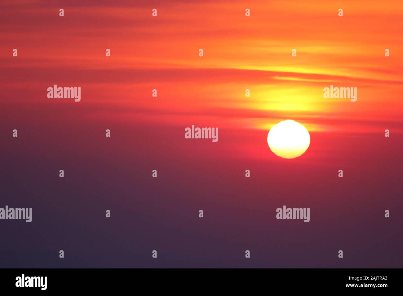 photo of big bright sun on sky background Stock Photo - Alamy