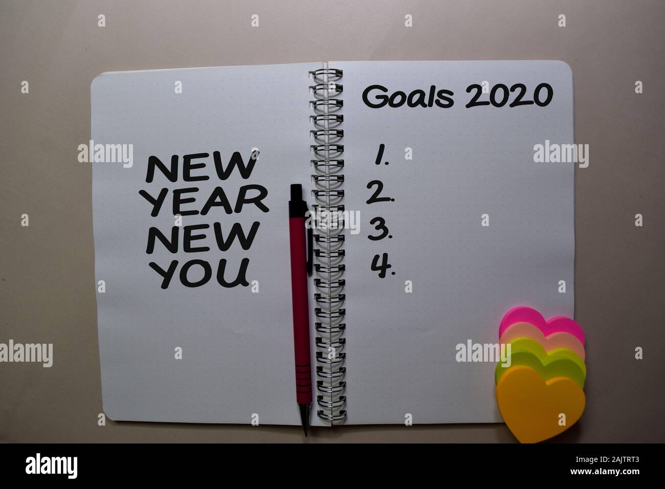 New Year New You and Goals 2020 write on a book isolated on Office Desk ...