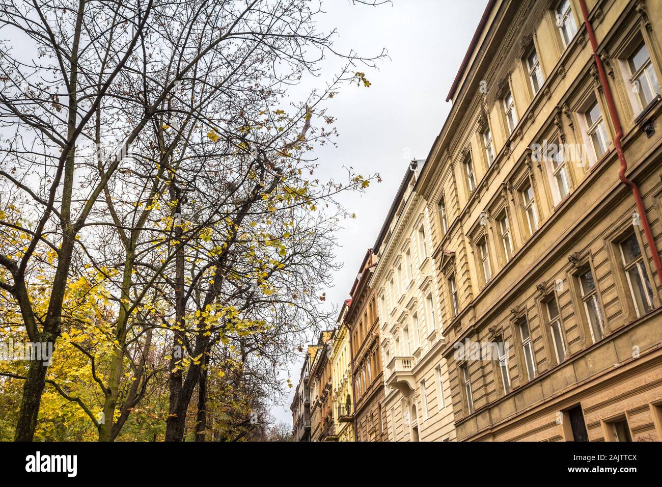 Facades in a typical street of Zizkov district in autumn, during a ...