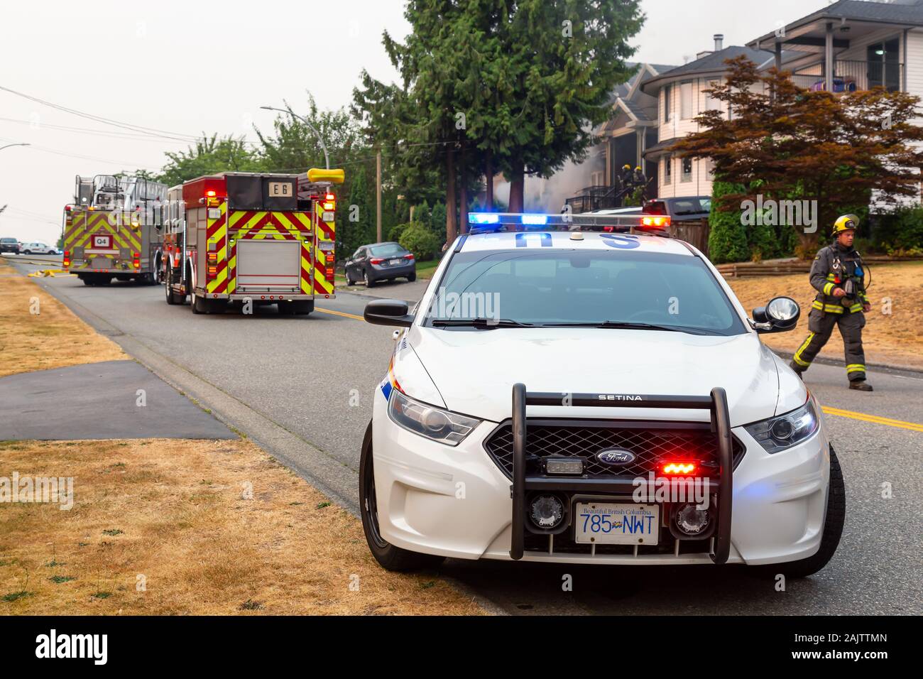 Police Car Blocking the road white Firefighters are responding to a ...