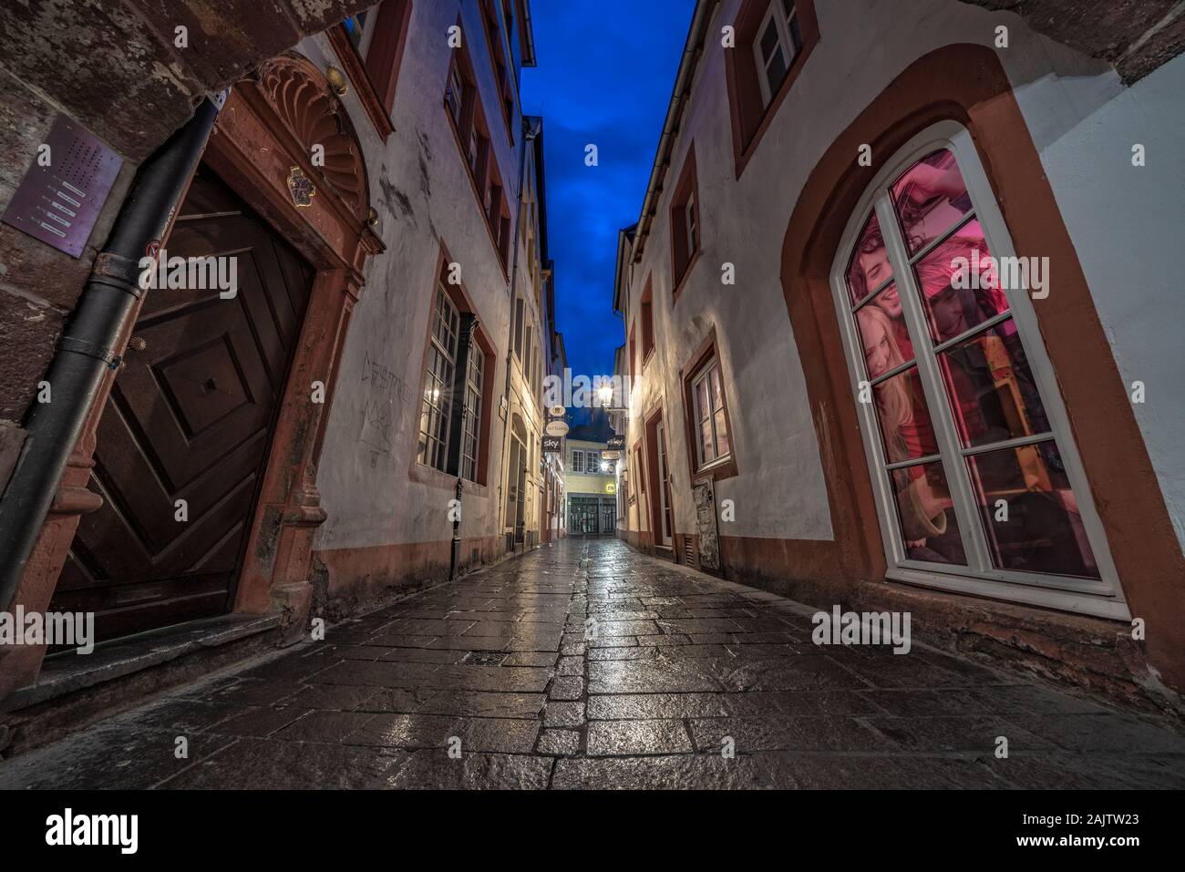 TRIER, GERMANY - SEPTEMBER 22: This is a night view of a small alley in ...