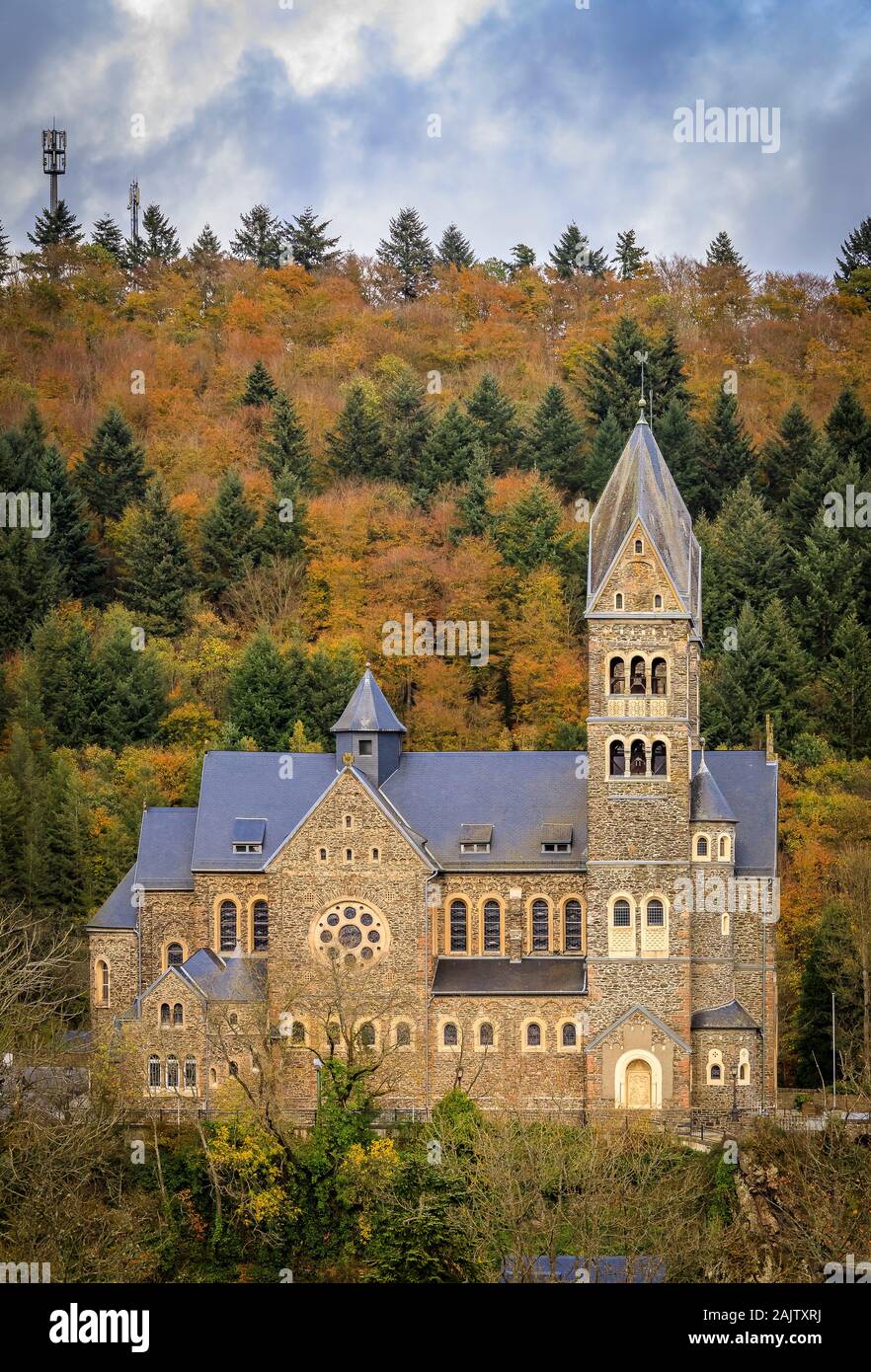 Stone facade of the neo romanesque Roman Catholic Church of Saints Come ...