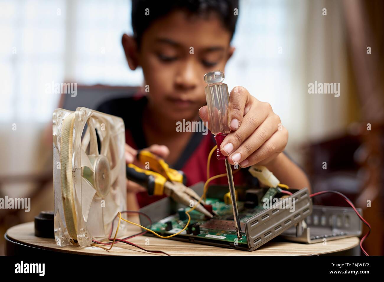 Child learning skill asia hi-res stock photography and images - Alamy