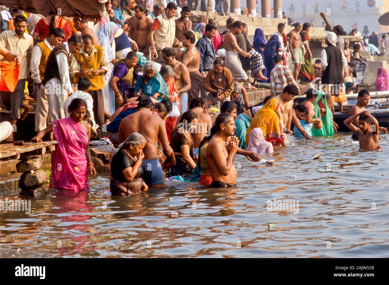 The ghats in Varanasi are busy with pilgrims every morning Stock Photo ...