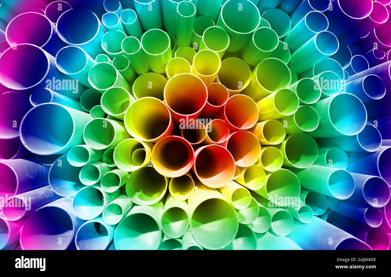 color rainbow of PVC pipes stacked in construction site Stock Photo - Alamy