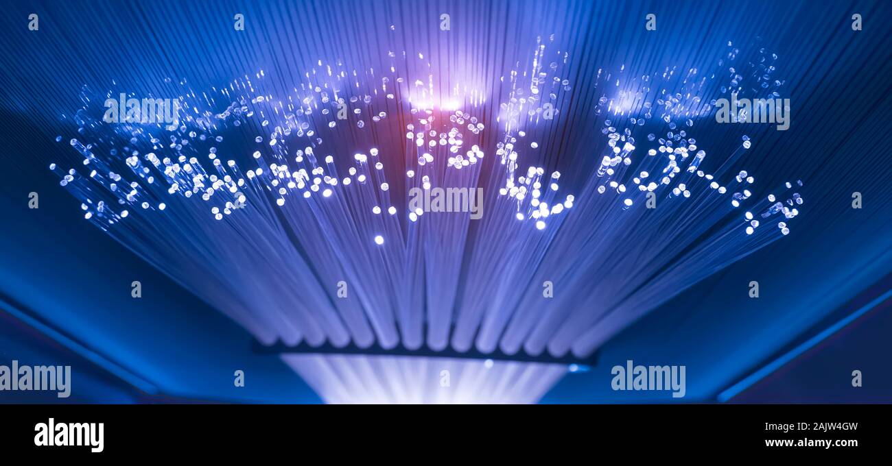 optical fibres dinamic flying from deep on technology background Stock ...