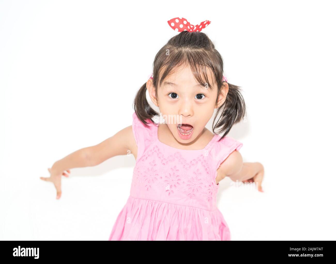 Young little cute asian girl smiling and laughing fun feeling excited ...