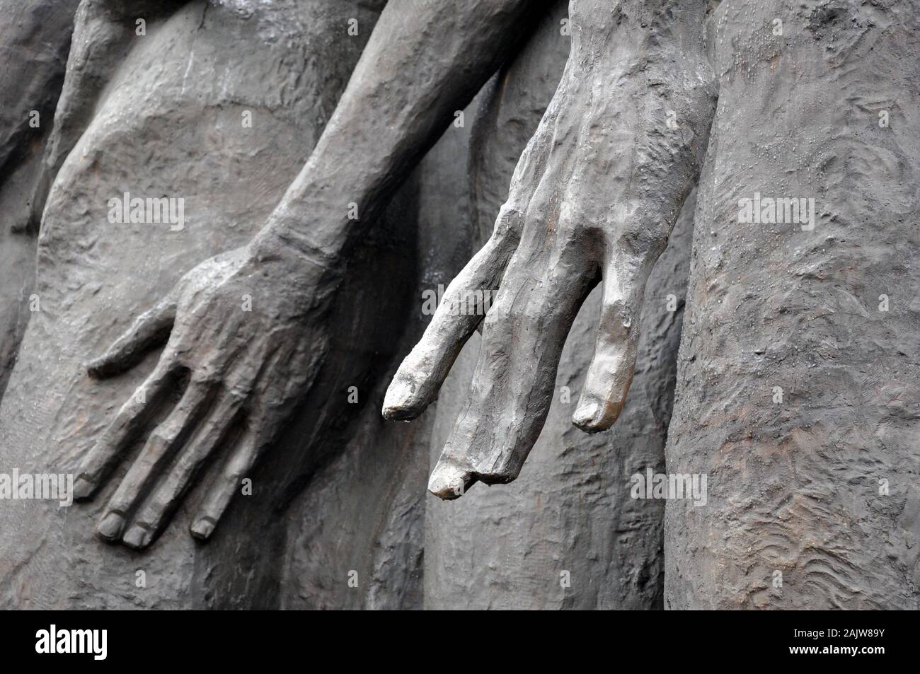 Details of a human hand on a monument in memory of the Holocaust in ...