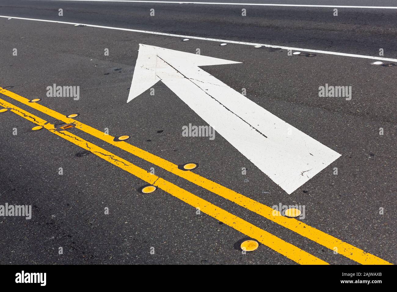 picture of an arrow sign on a road Stock Photo - Alamy