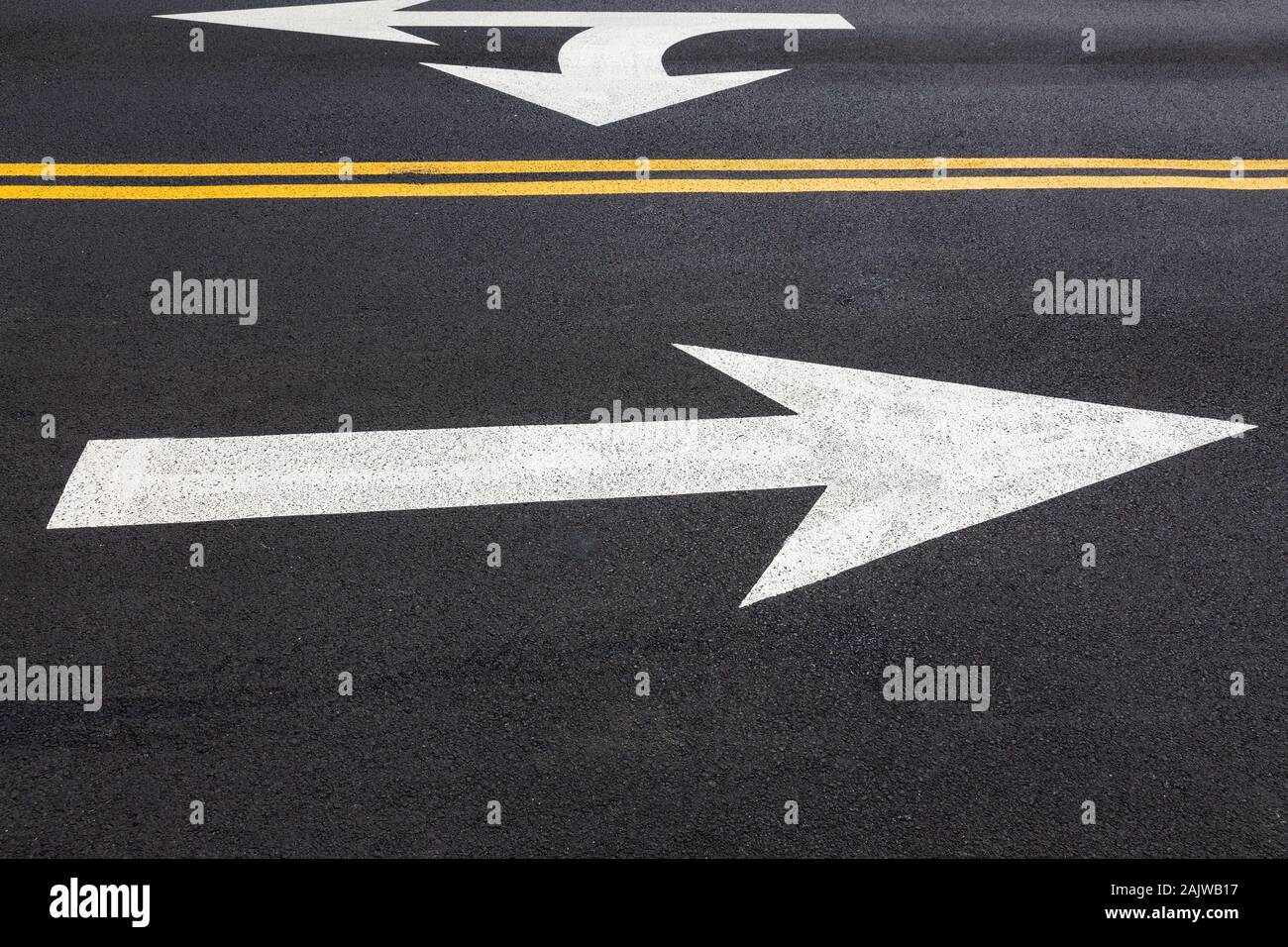 picture of an arrow sign on a road Stock Photo - Alamy