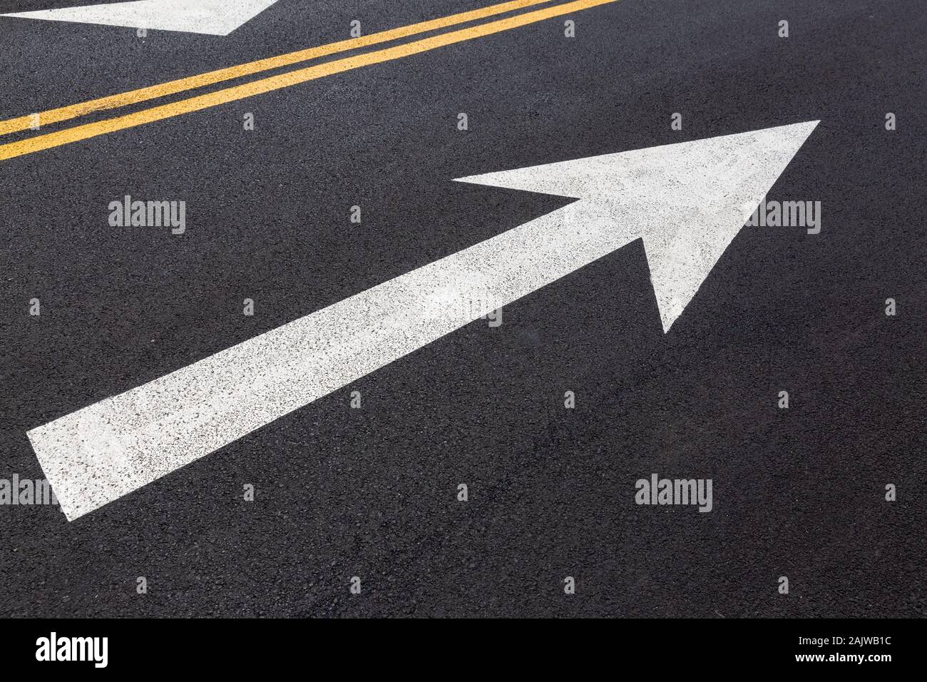 picture of an arrow sign on a road Stock Photo - Alamy