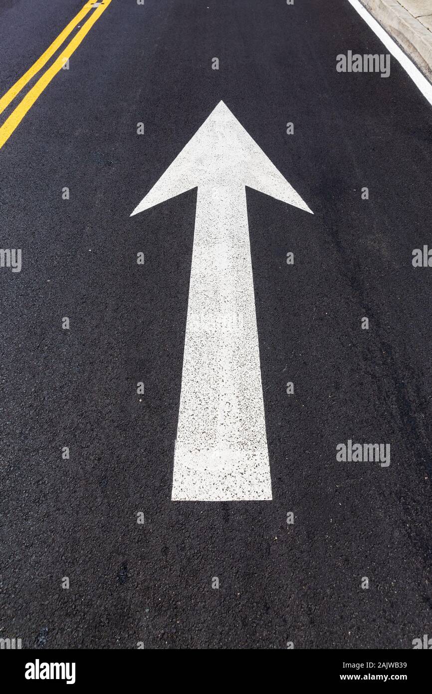 picture of an arrow sign on a road Stock Photo - Alamy