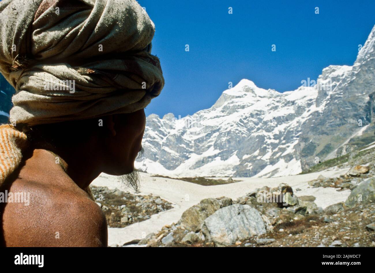 Shiva-Sadhu walking up towards Neelkant to get closer to god high above ...