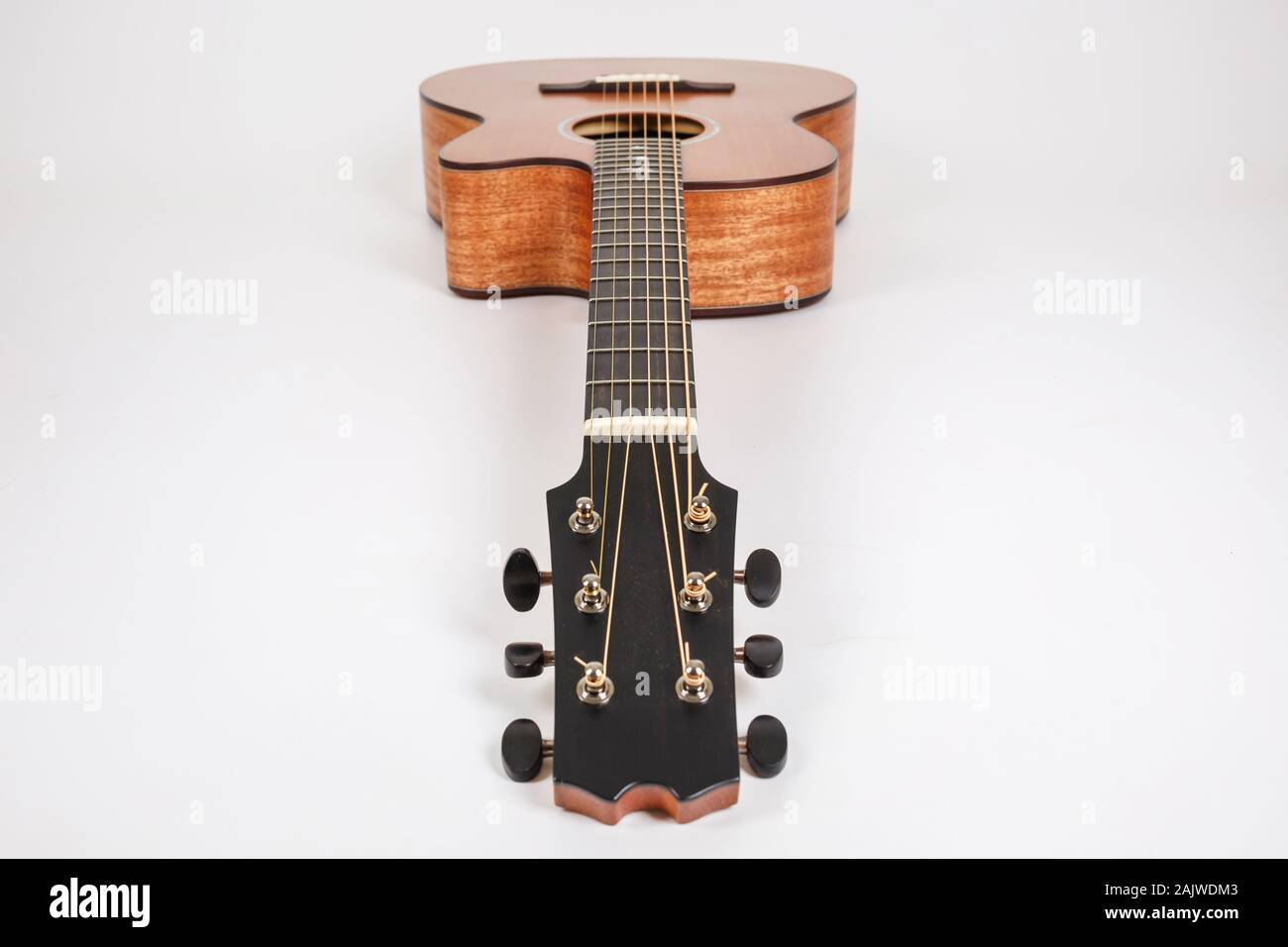 wood texture of lower deck of six strings acoustic guitar on white ...