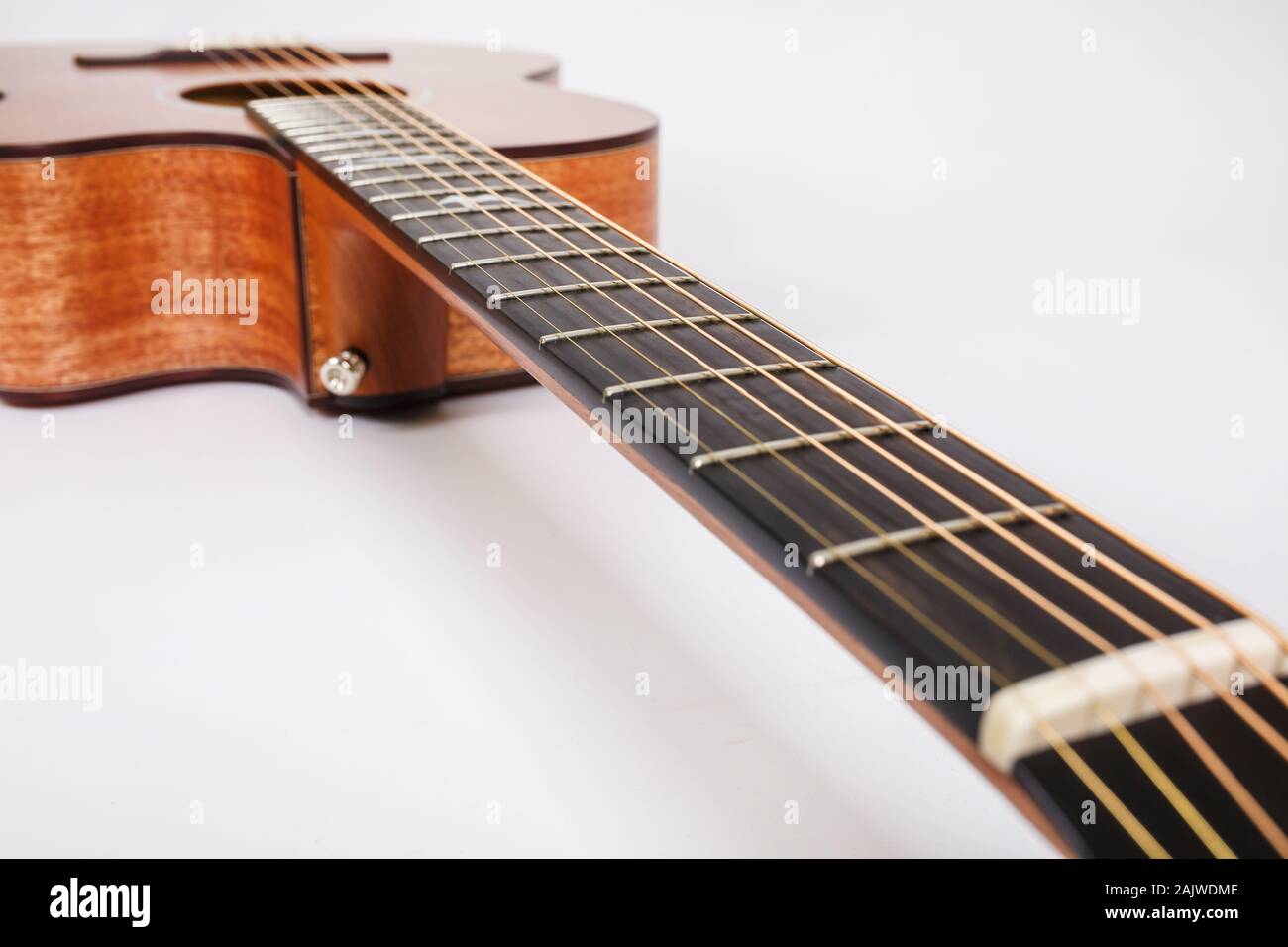 wood texture of lower deck of six strings acoustic guitar on white ...