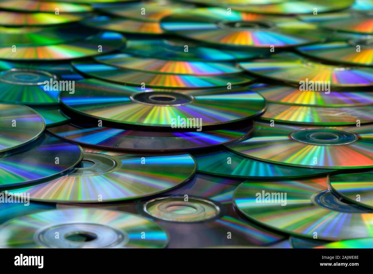 An array of cds catch the light Stock Photo - Alamy