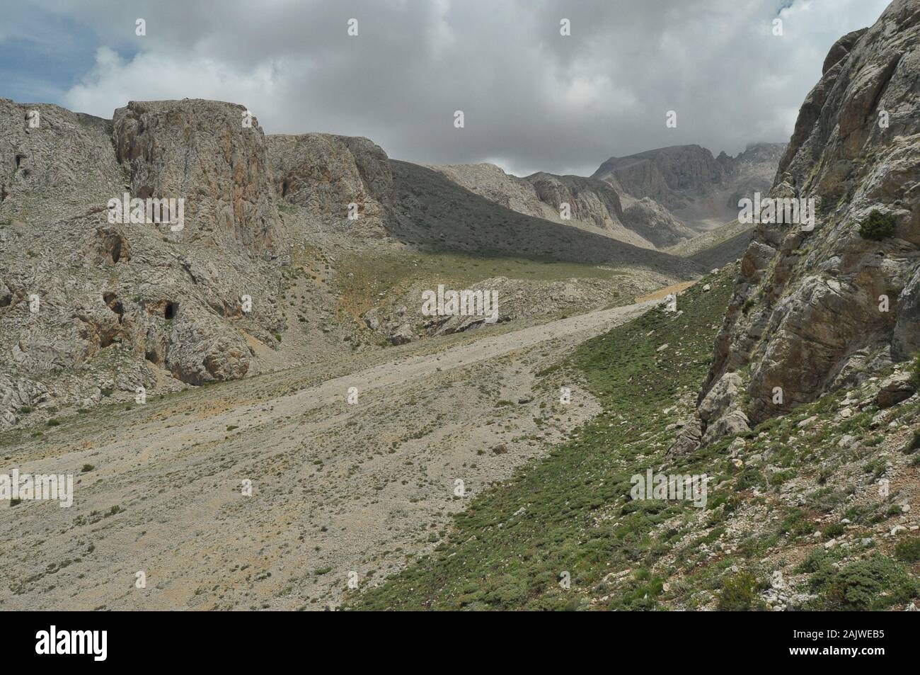Taurus Mountains. Turkey. Steep cliffs and gorge. Snow-capped peaks ...