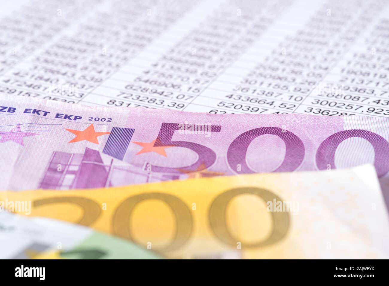 Euro banknotes and spreadsheet Stock Photo - Alamy