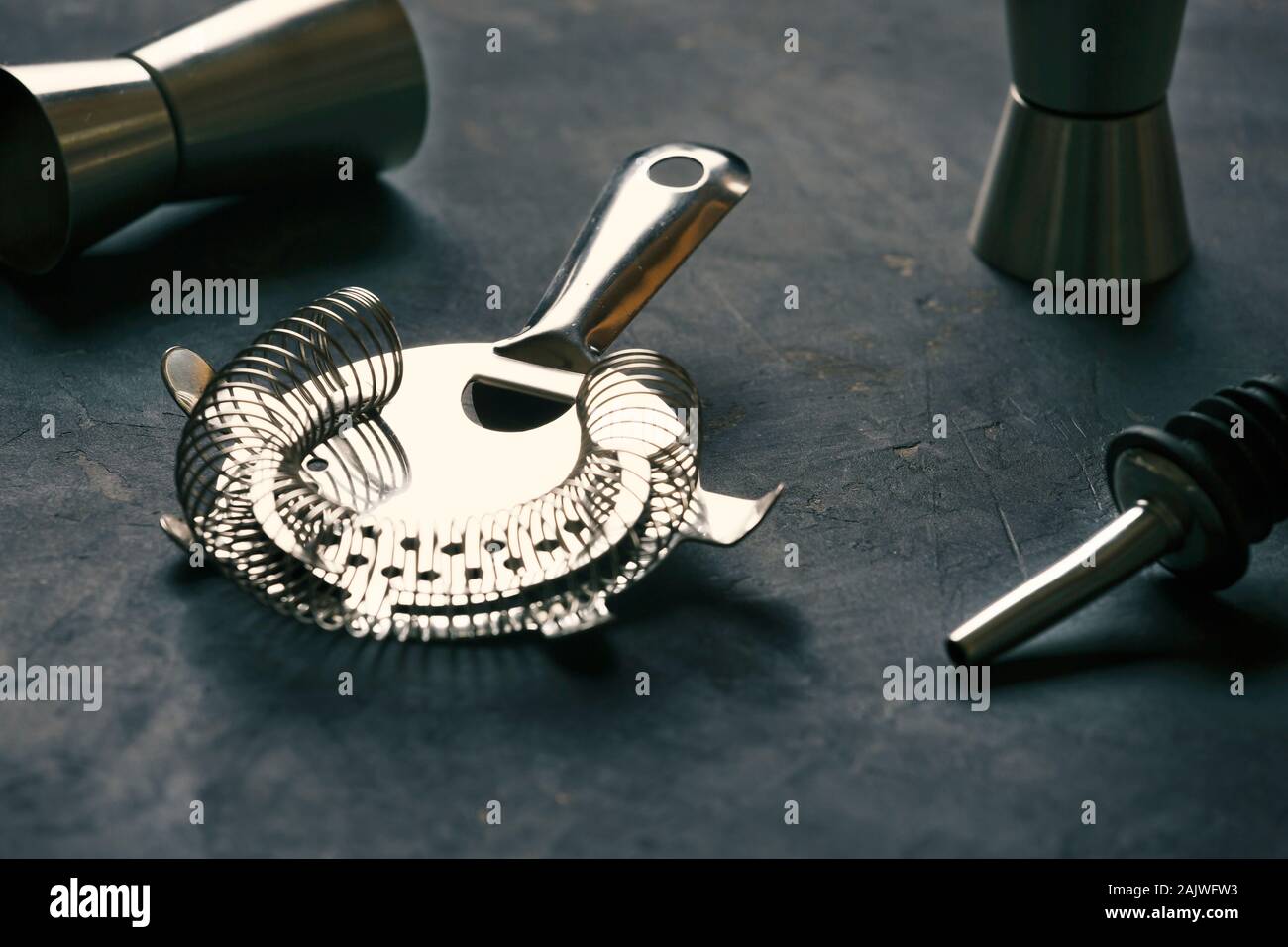 Bartender tools on dark concrete. Bar concept Stock Photo - Alamy