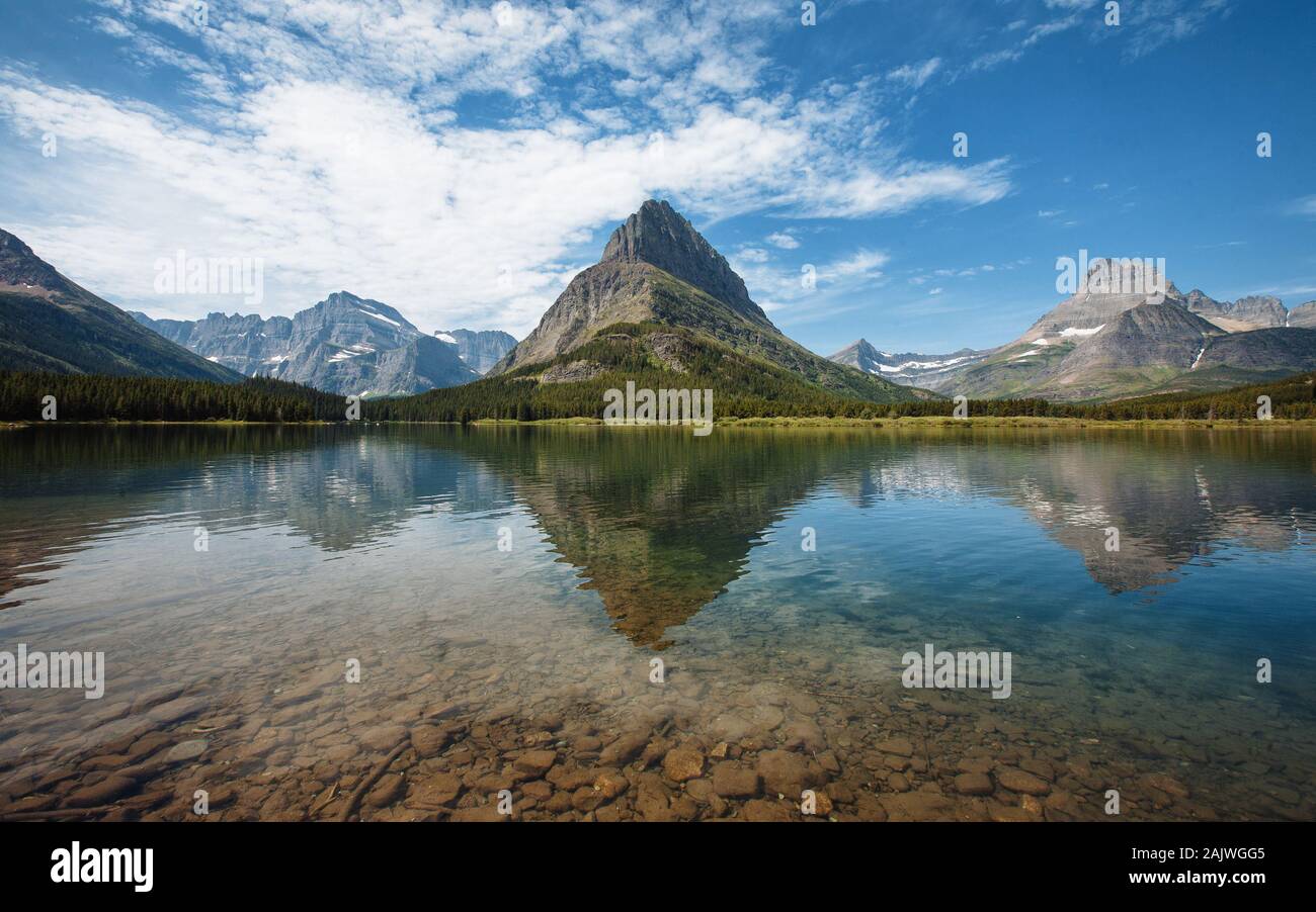 Reflections at Swiftcurrent Lake at Many Glacier (Glacier National Park ...