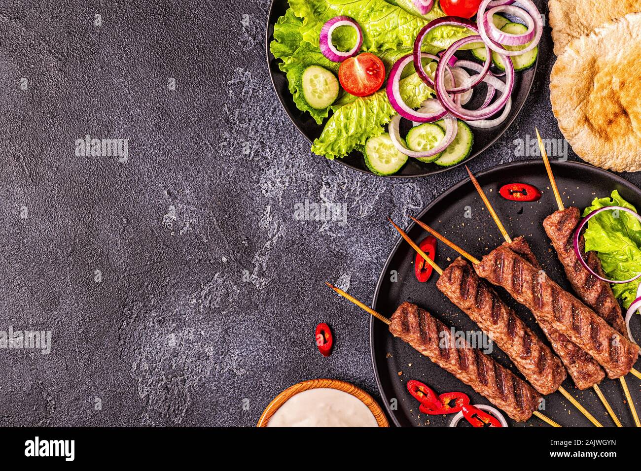 Traditional middle eastern, arabic or mediterranean meat kebab with ...