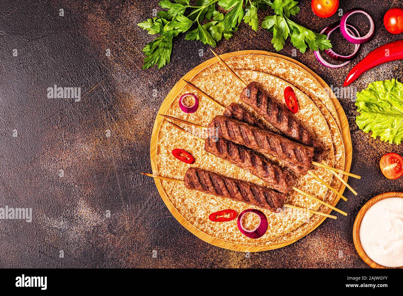 Traditional middle eastern, arabic or mediterranean meat kebab with ...