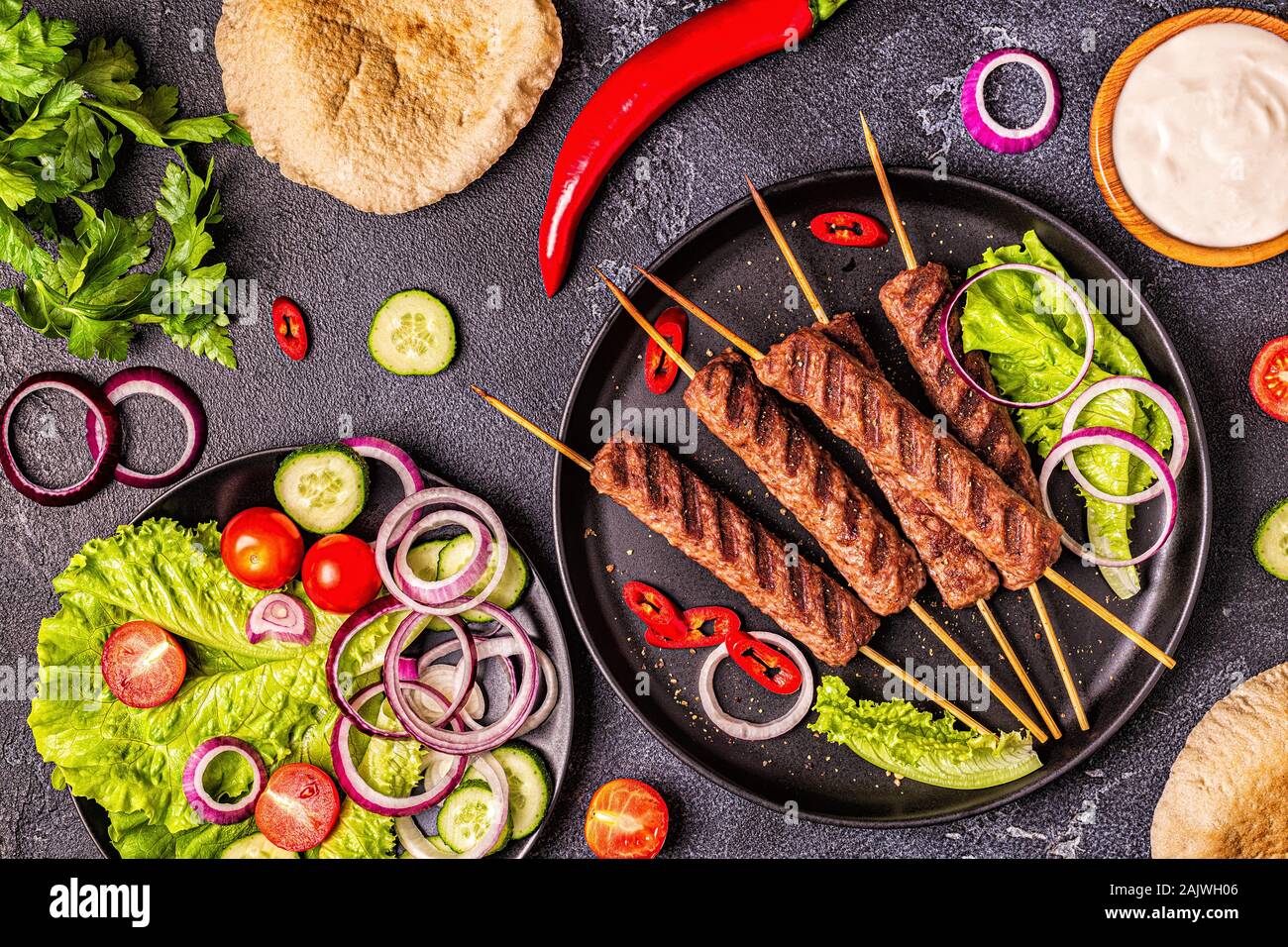 Traditional middle eastern, arabic or mediterranean meat kebab with ...
