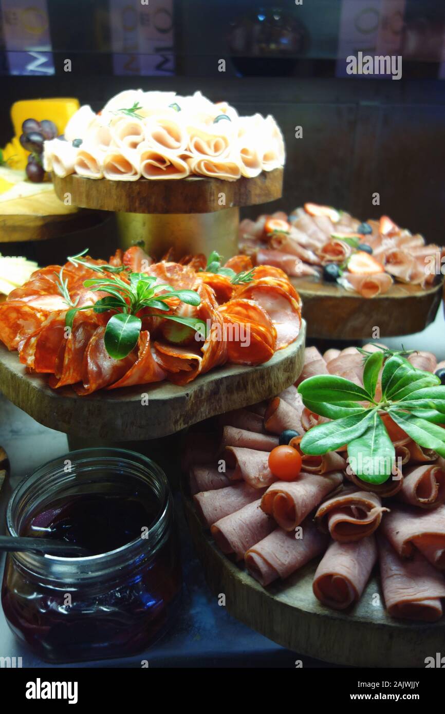 Various Sliced Processed Cold Meats on Display in the Buffet at the ...