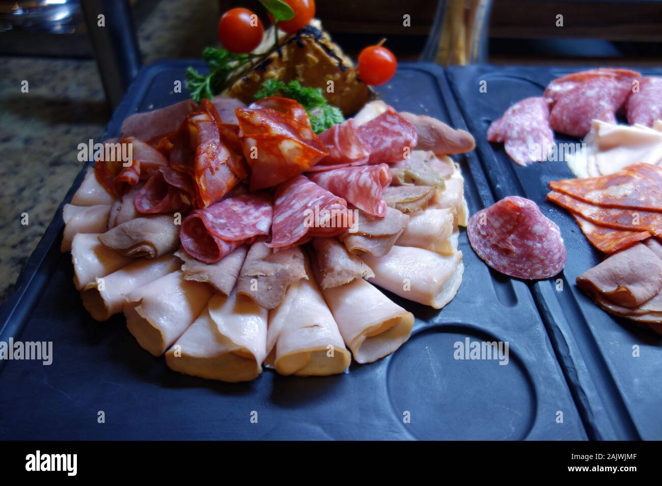 Various Sliced Processed Cold Meats on Display in the Buffet at the ...