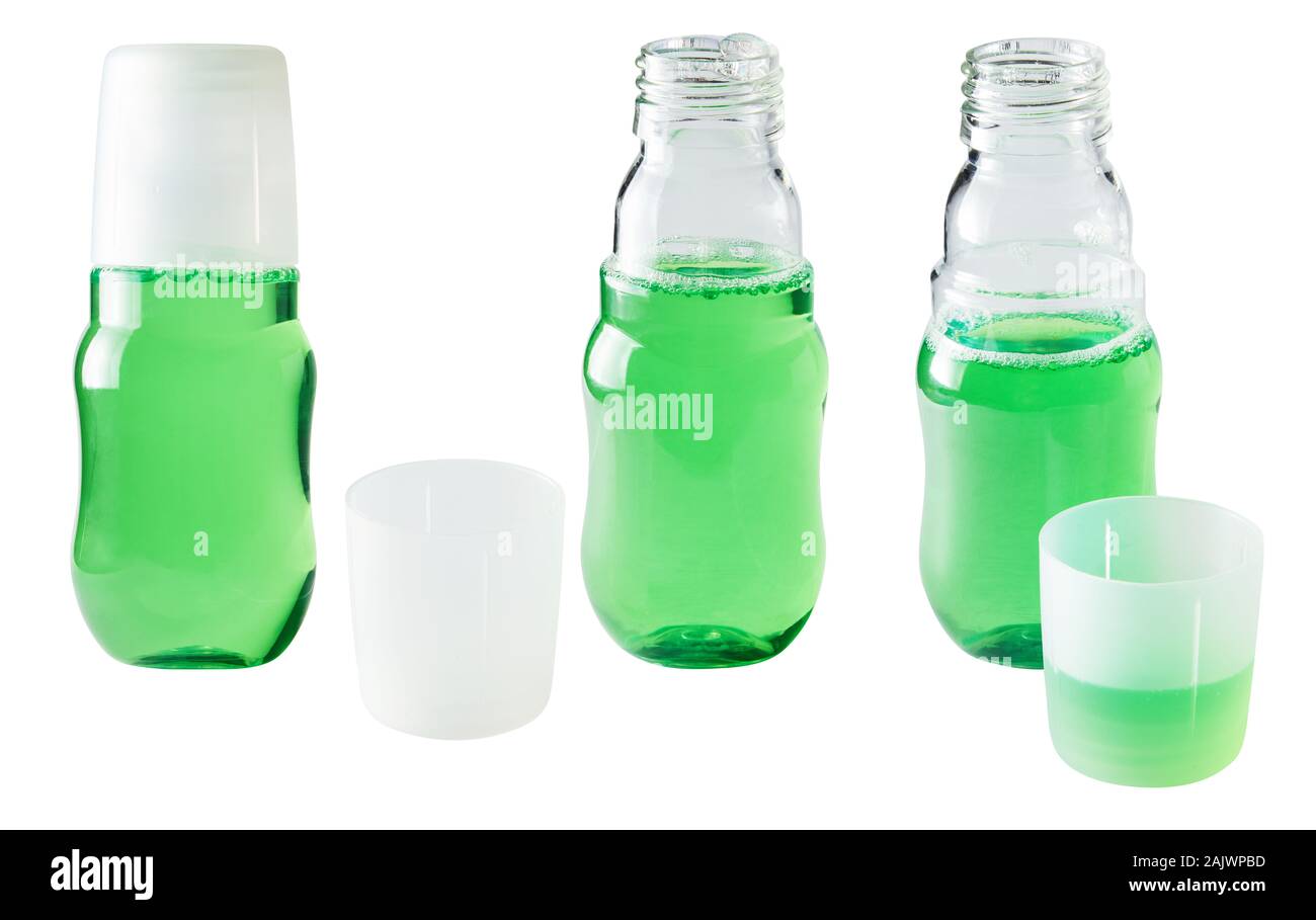 Plastic bottle with green mouthwash for teeth care isolated on white ...